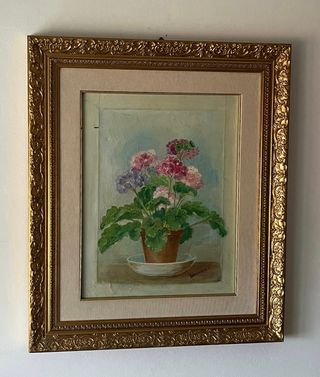 Quadro con cornice dorata