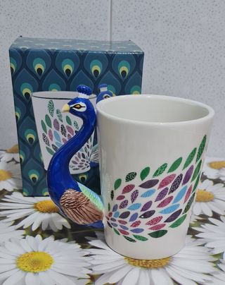 Tazza in ceramica a forma di pavone nuova