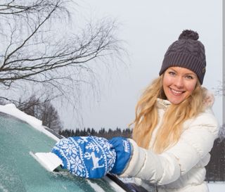 Raschietto per il. ghiaccio con un quanto 