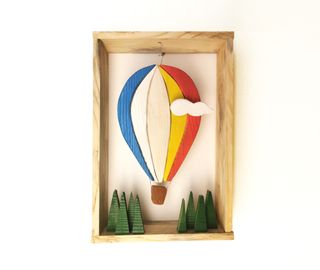 Mongolfiera in cornice di legno
