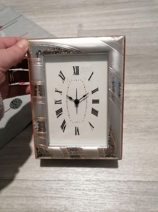 orologio da tavolo con il contorno di argento 