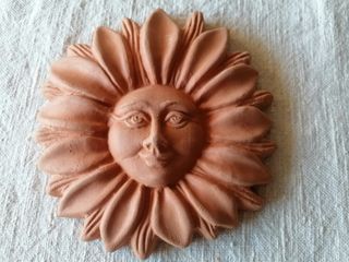 Decorazione in terracotta
