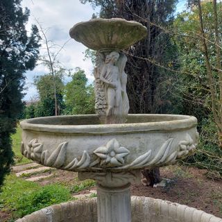 statue e portafiori da giardino in pietra fatte a 