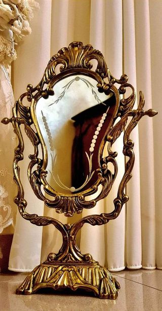 Maestoso specchio psiche basculante in bronzo