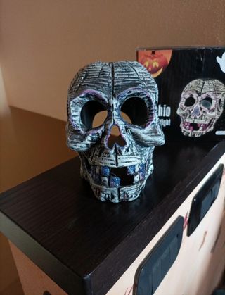 Portacandela a forma di teschio 