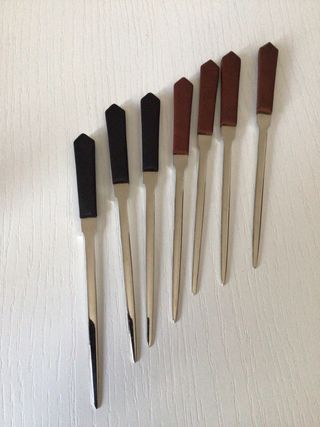 7 tagliacarte rivestiti in pelle