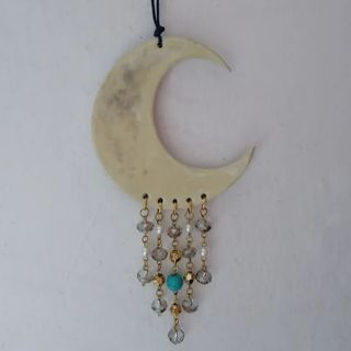 acchiappasole a forma di luna