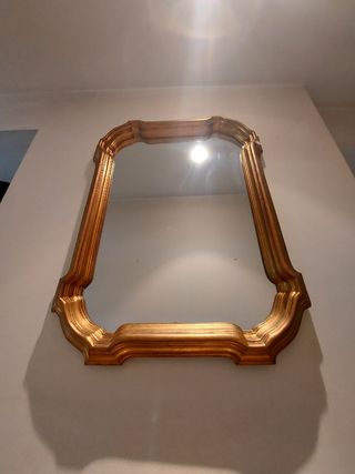 specchio con cornice d'orata