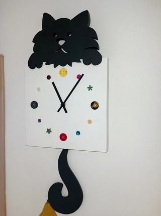 orologio a pendolo da parete con gatto