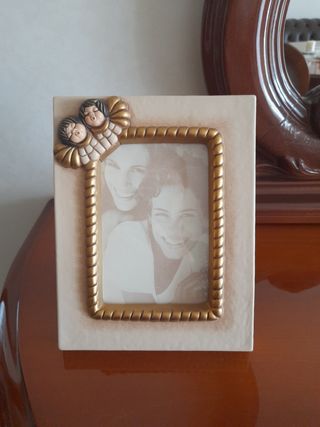 Cornice Thun con coppia di angeli