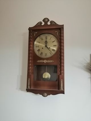 orologio pendolo da parete
