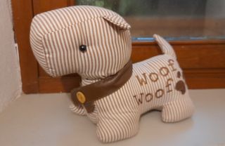 Fermaporta forma cane 