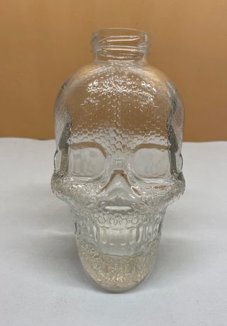 Contenitore a forma di teschio di vetro 