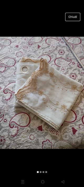 coppia di tende bianche e oro