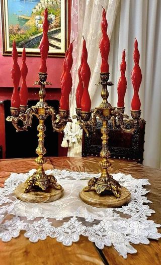 Antica coppia di candelabri in bronzo a 5 fiamme