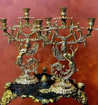 coppia di candelabri a 3 fiamme con angeli cupidi 