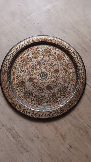 piatto decorativo in metallo