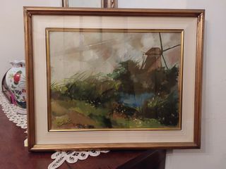 Quadro con cornice dorata 