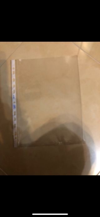 Confezione di 100 buste trasparenti perforate