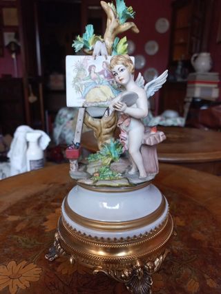 statuetta putto pittore 