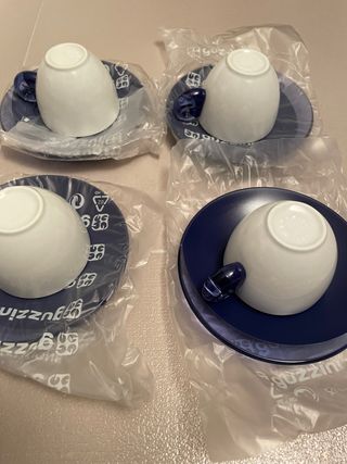 Set 4 tazzine caffe e piattini Guzzini
