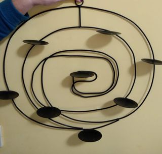 Porta candele di ferro da muro 