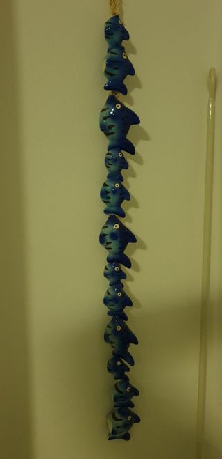 decorazione pesci in ceramica 