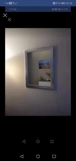 Specchio e cornice argentate