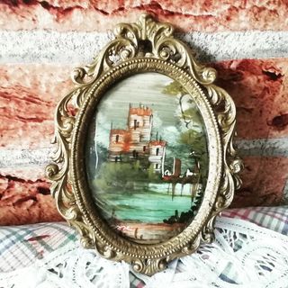 cornice di metallo dorato, vintage