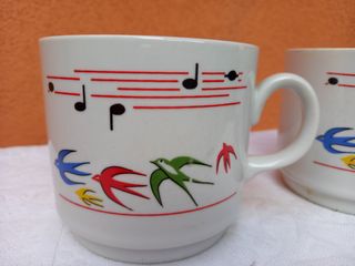 Coppia tazze colazione con rondini
