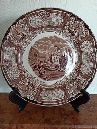 Antico piatto decorativo in porcellana Cobella