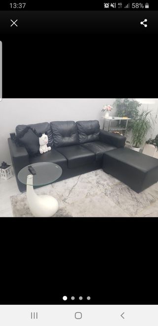 divano in ecopelle con pouf 