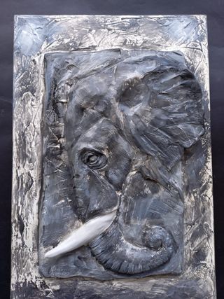 Elefante bassorilievo in terracotta 