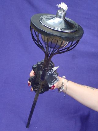 Fiaccola da muro con lampada a olio. 