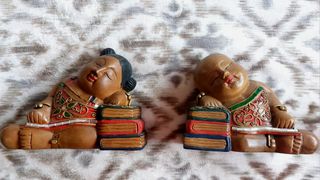 coppia Buddha ferma libri 