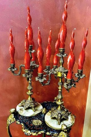 Antica coppia di candelabri in bronzo a 5 fiamme