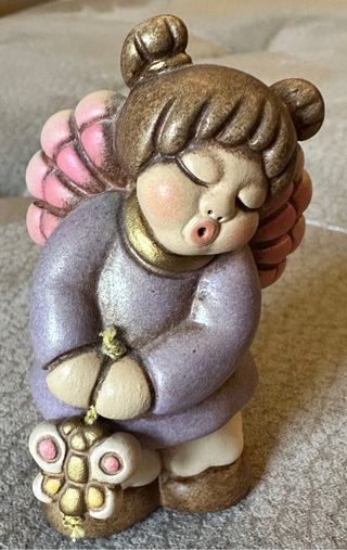 Bambina con farfalla Thun