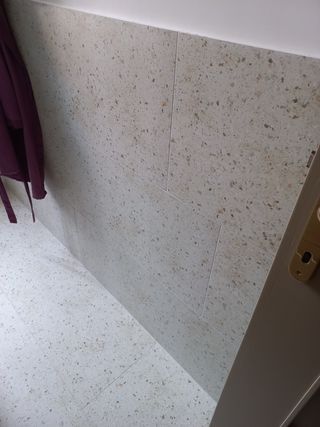 Piastrelle ceramica effetto graniglia