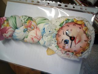 orologio con treccia a muro 