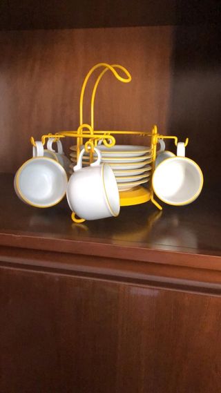 tazzine caffè con piattini e supporto