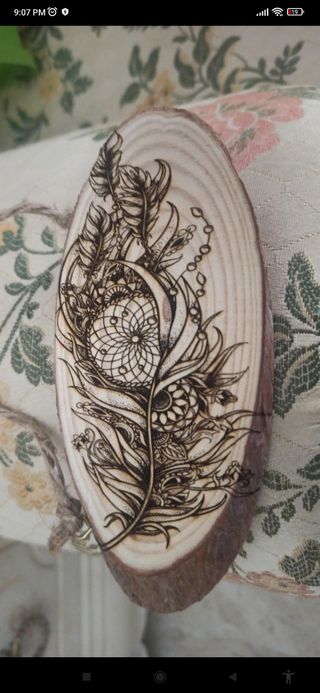 Quadretto con incisione laser Piuma mandala