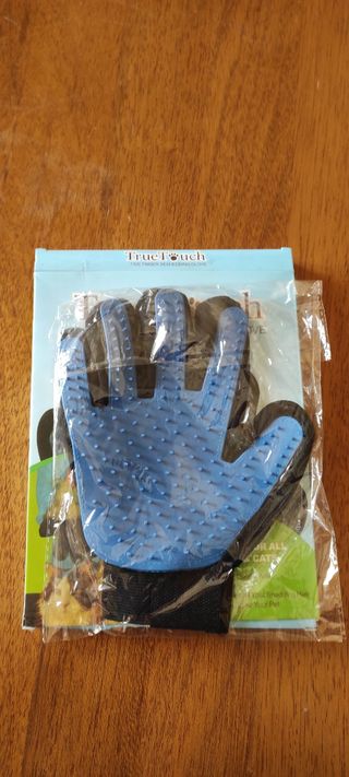 true touch guanto raccoglipelo massaggiante