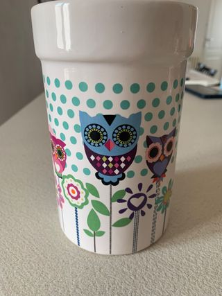 Vaso in ceramica con gufi