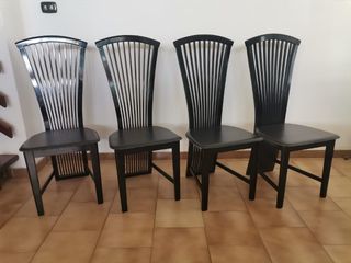 set di 4 sedie smaltate nere. seduta in pelle....