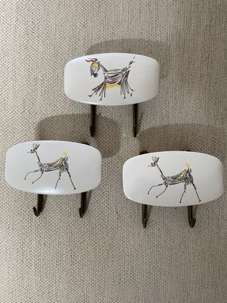 Tre appendiabiti vintage