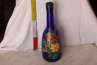 Bottiglia in vetro con decorazione 