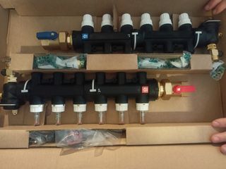 Gruppo collettori in materiale composito premonta