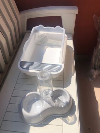 Lettiera e dispenser x piccoli animali domestici