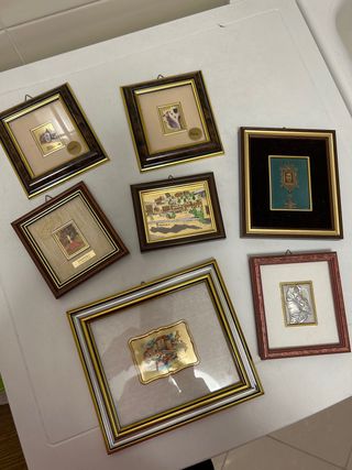 7 piccoli quadri su foglia oro.