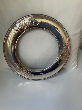 Cornice circolare in argento per specchio